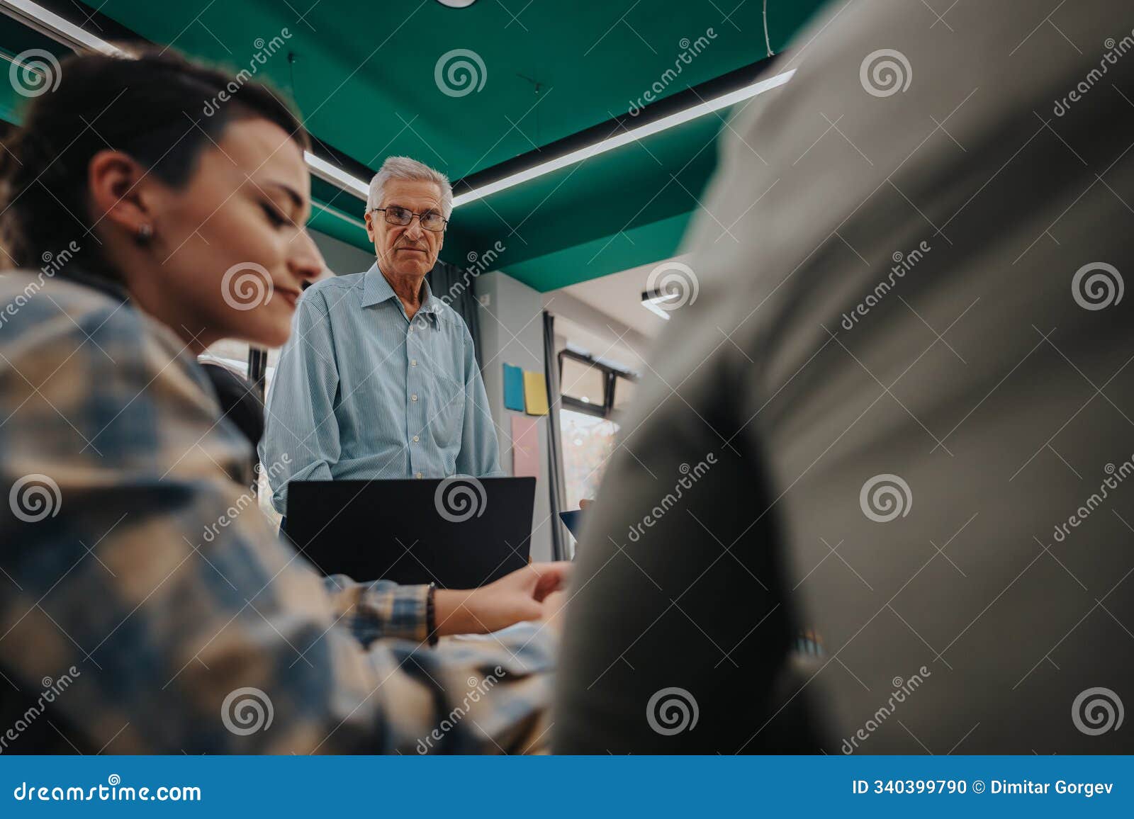 College Students Collaborating with Guidance from an Elderly Professor ...