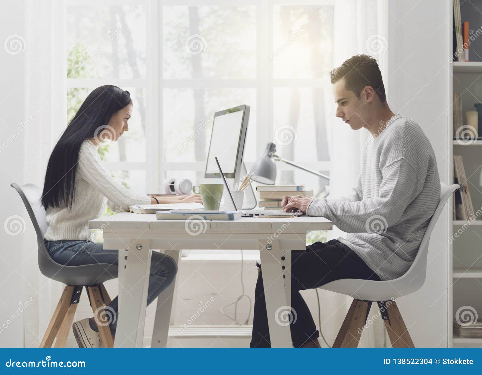 College Students Connecting and Studying in the Library Stock Photo ...