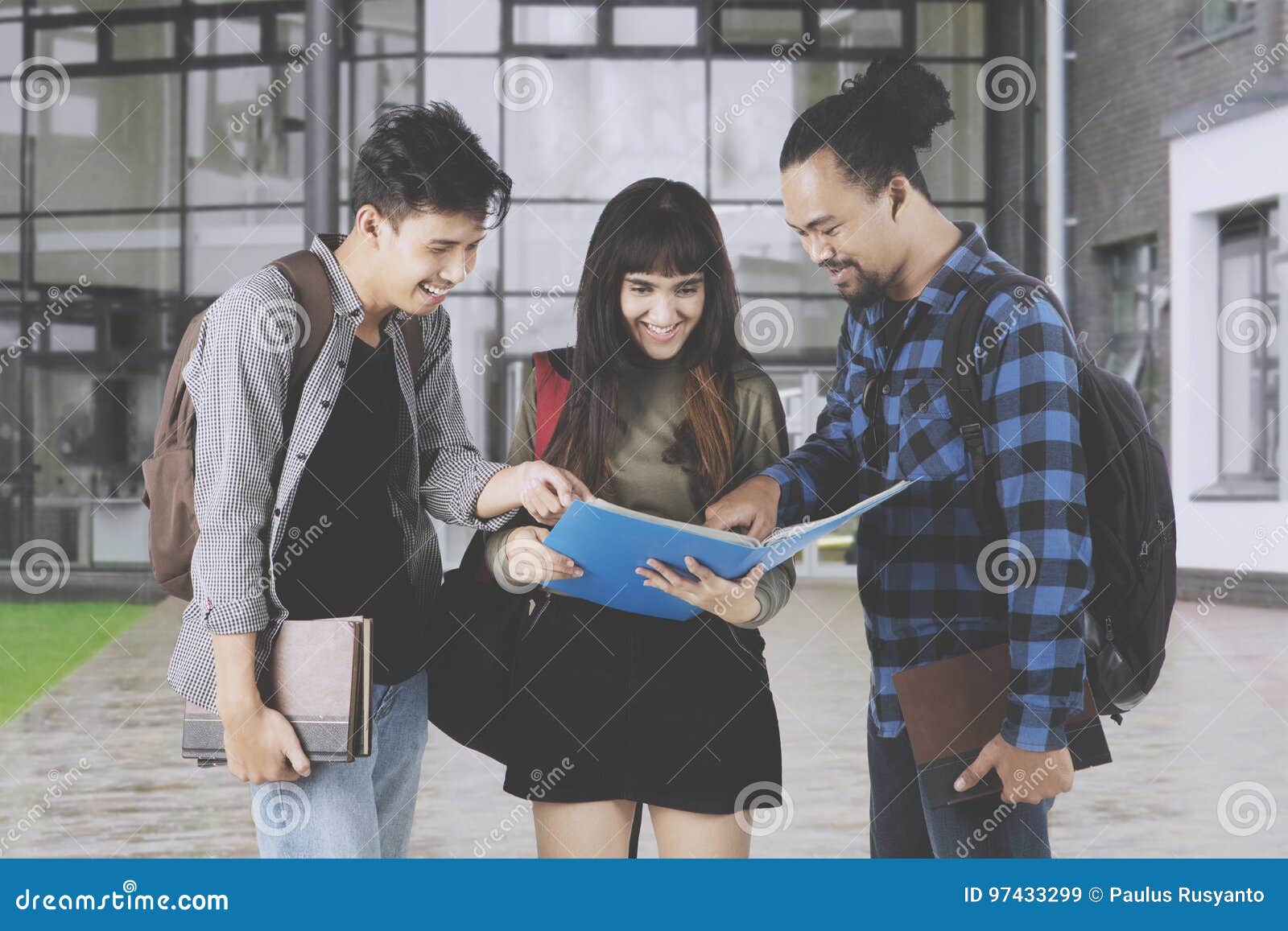 College Students Discussing an Assignment Stock Image - Image of ...