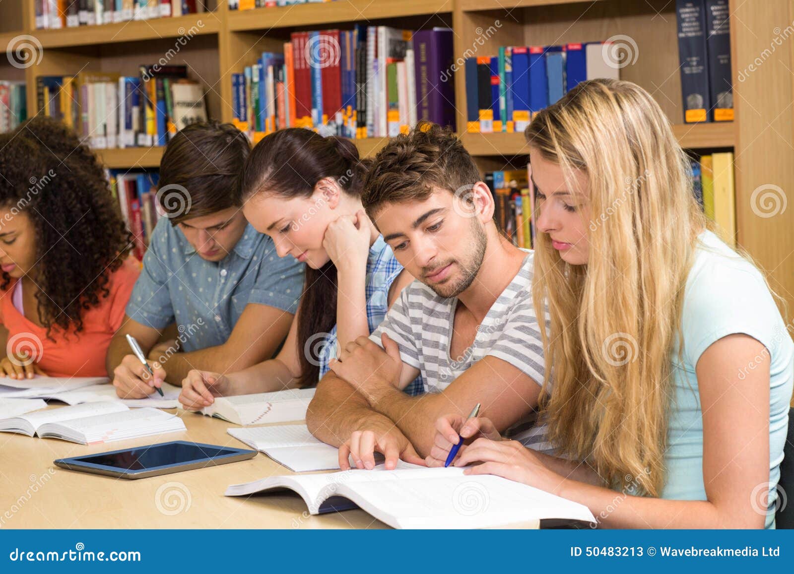 College Students Doing Homework in Library Stock Image - Image of adult ...