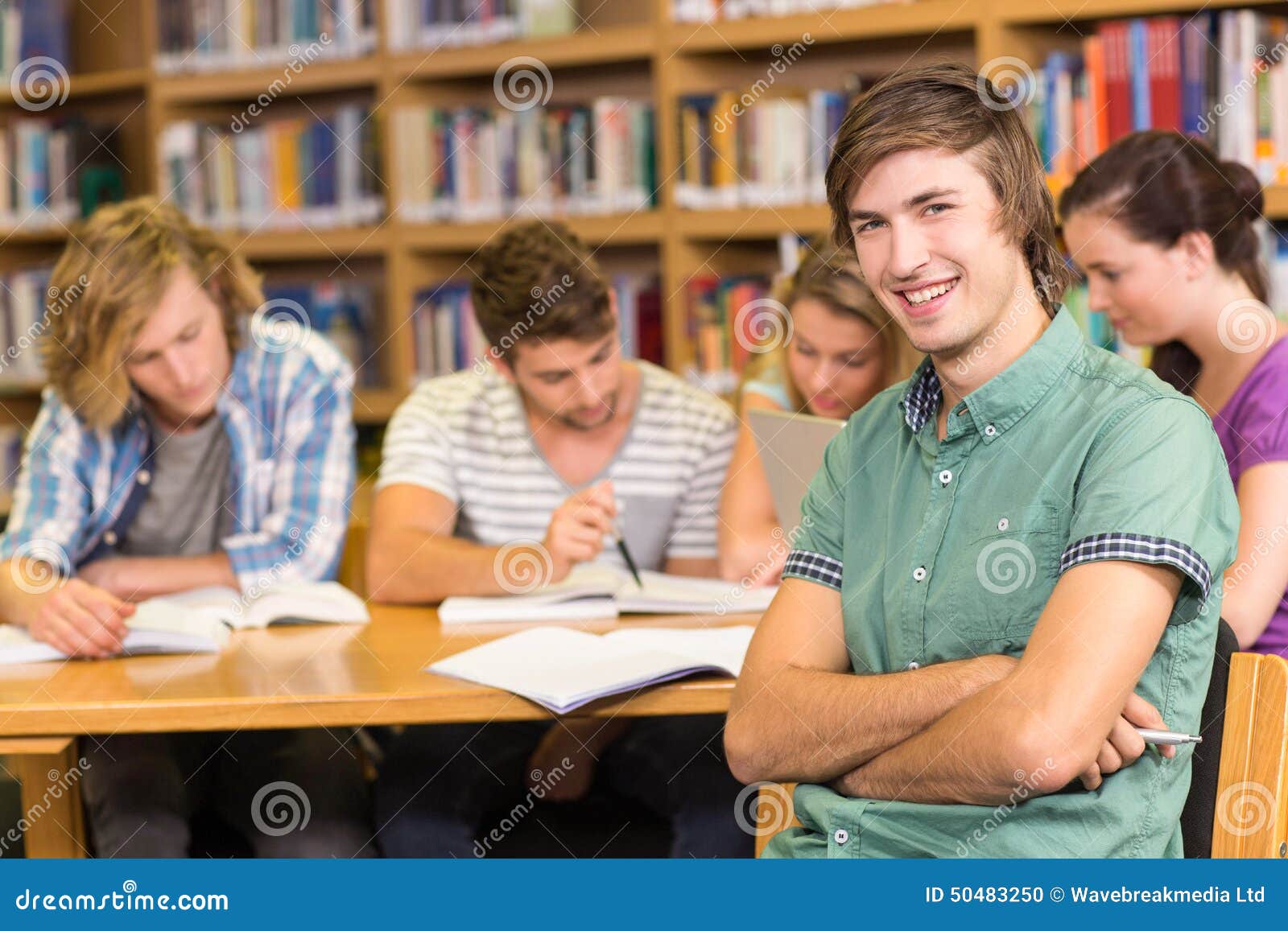 College Students Doing Homework in Library Stock Photo - Image of ...