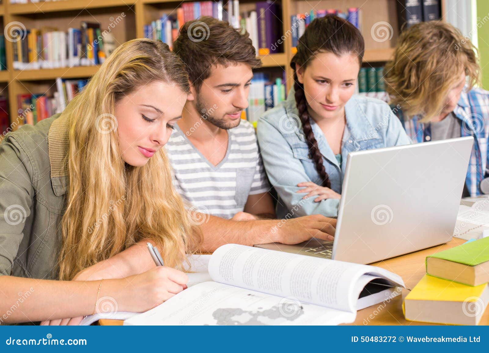 College Students Doing Homework in Library Stock Photo - Image of front ...