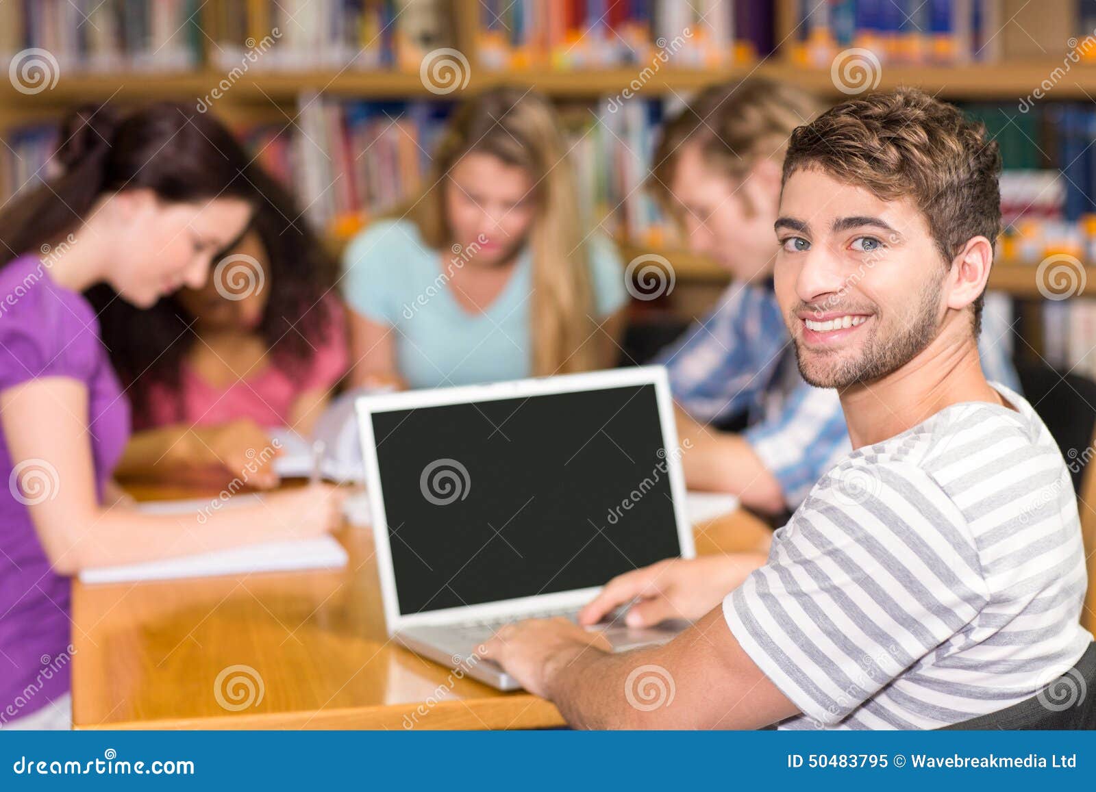 College Students Doing Homework in Library Stock Image - Image of focus ...