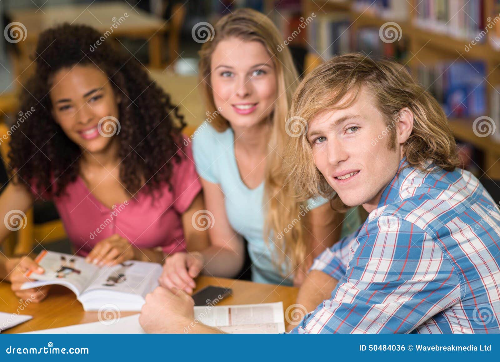 College Students Doing Homework in Library Stock Photo - Image of ...