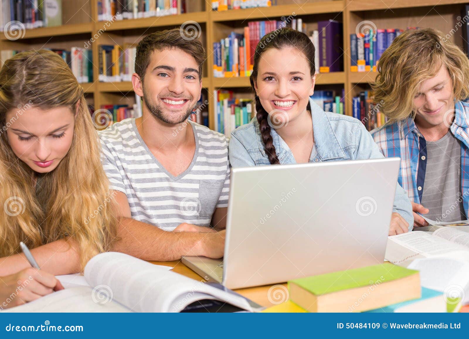 College Students Doing Homework in Library Stock Image - Image of adult ...