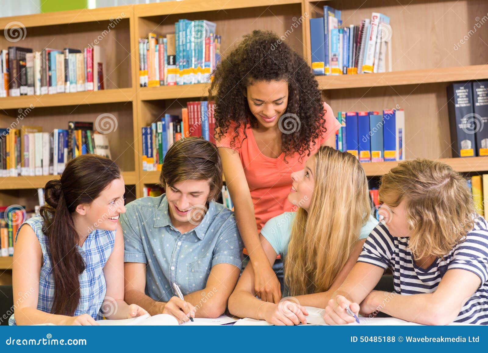 College Students Doing Homework in Library Stock Photo - Image of ...