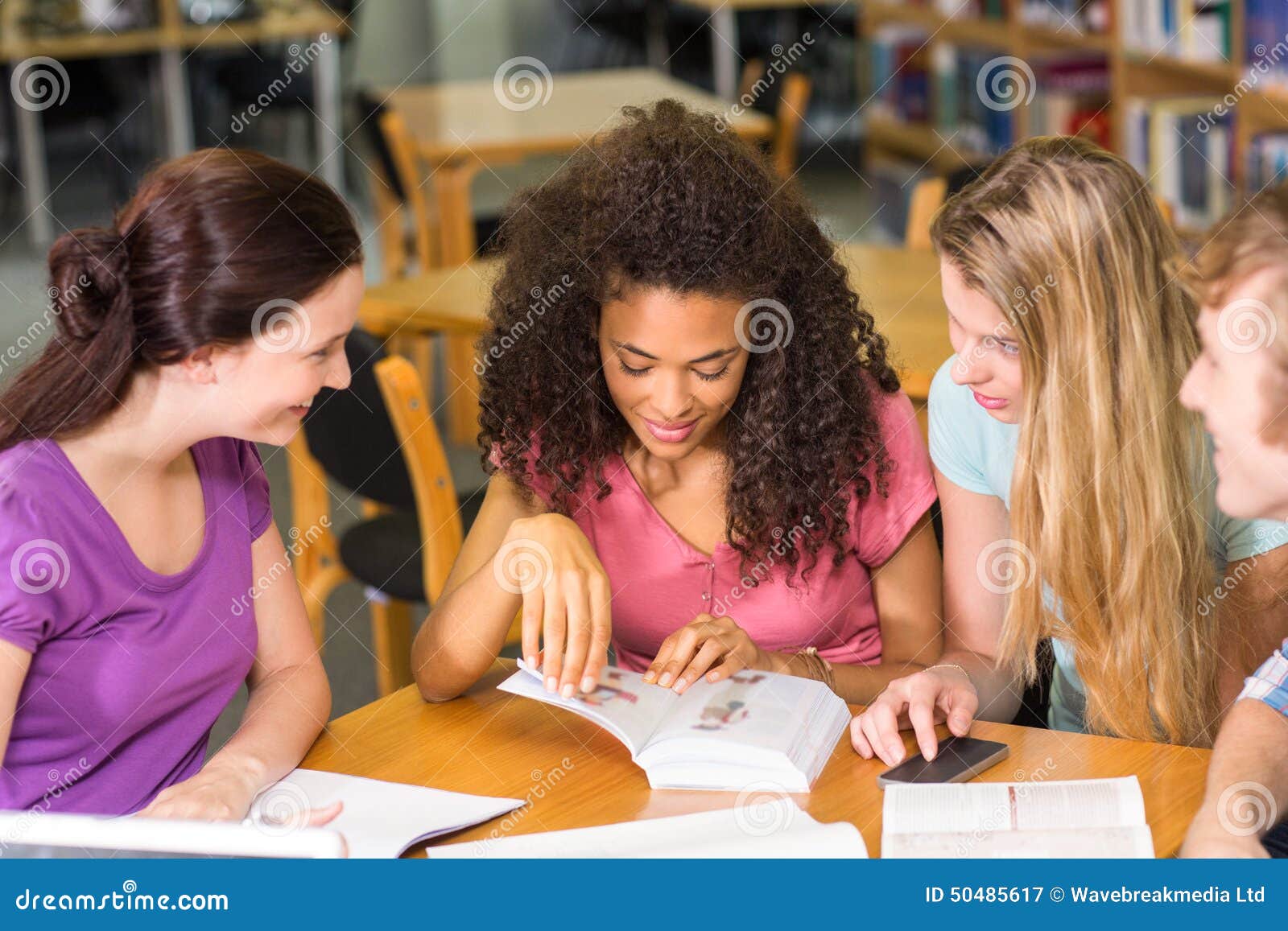 College Students Doing Homework in Library Stock Image - Image of ...