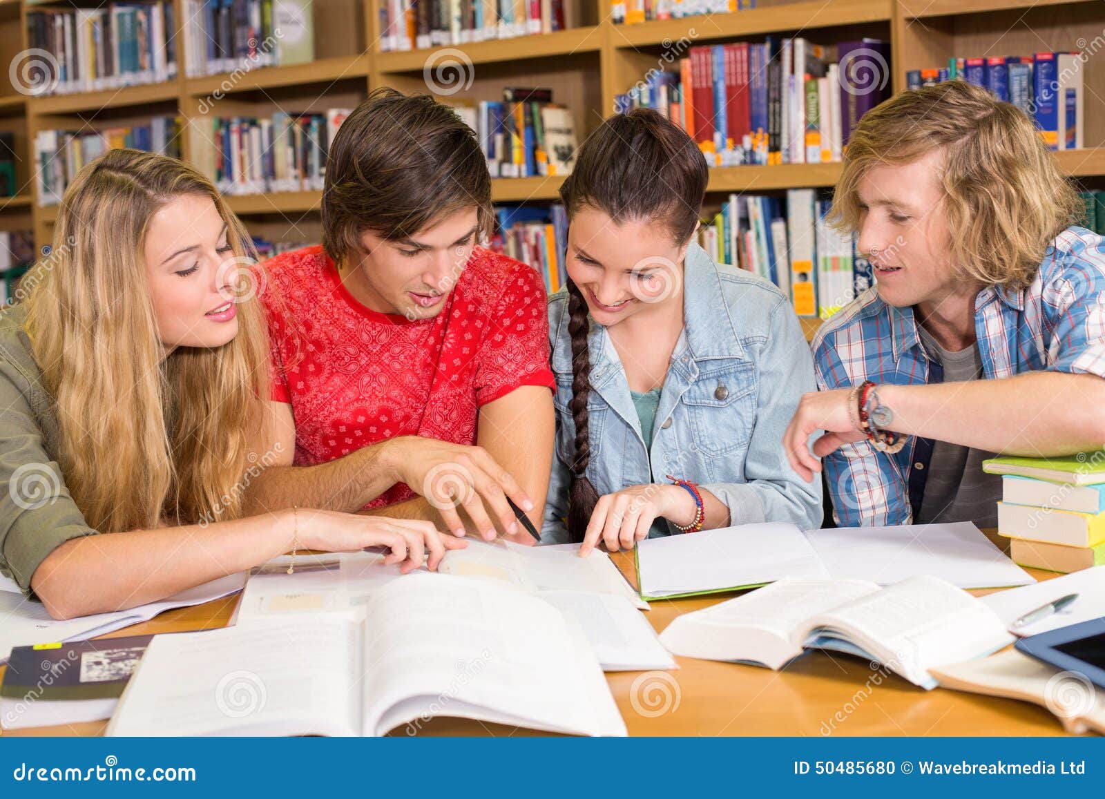 College Students Doing Homework in Library Stock Photo - Image of adult ...