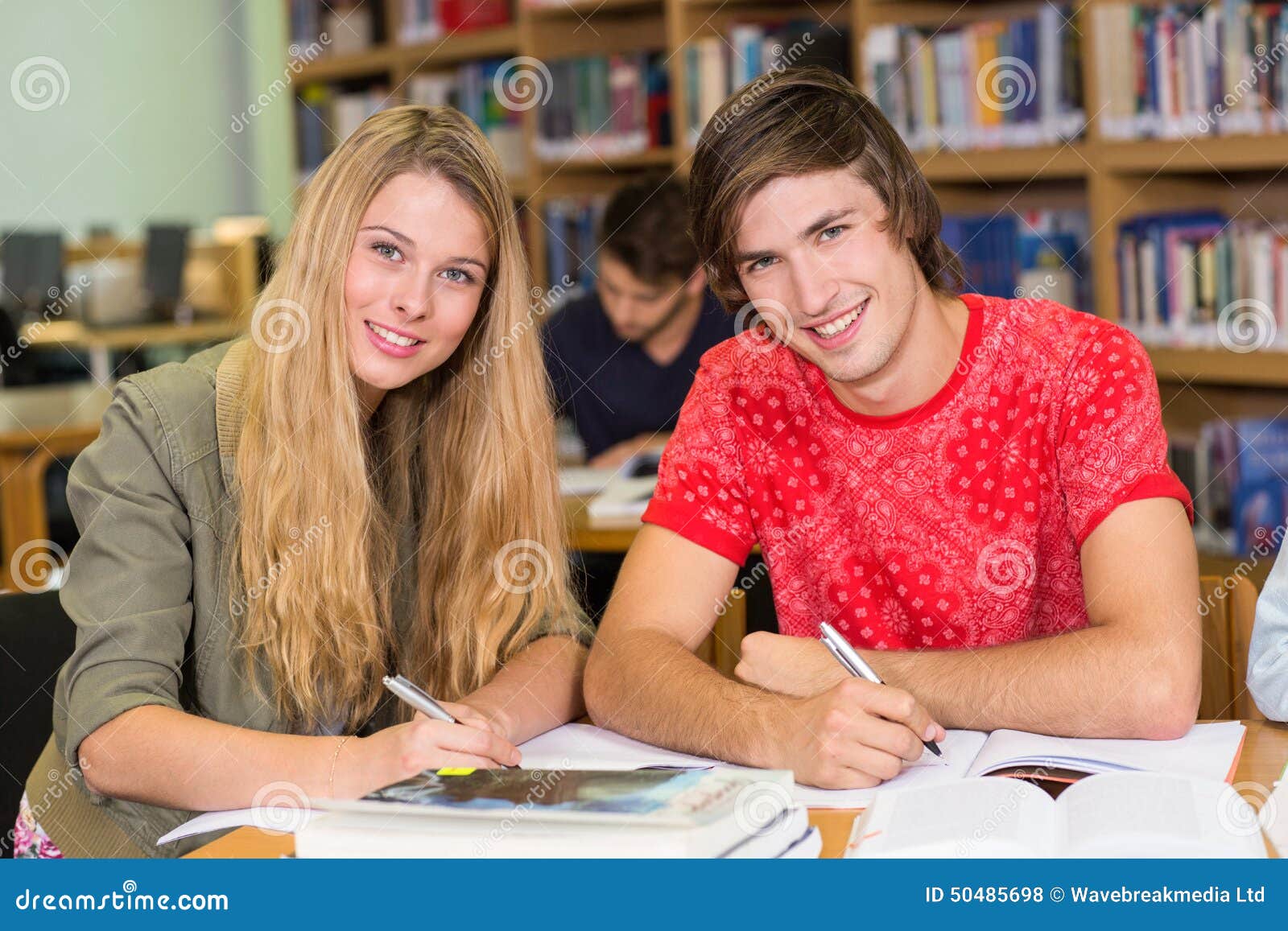 College Students Doing Homework in Library Stock Photo - Image of front ...