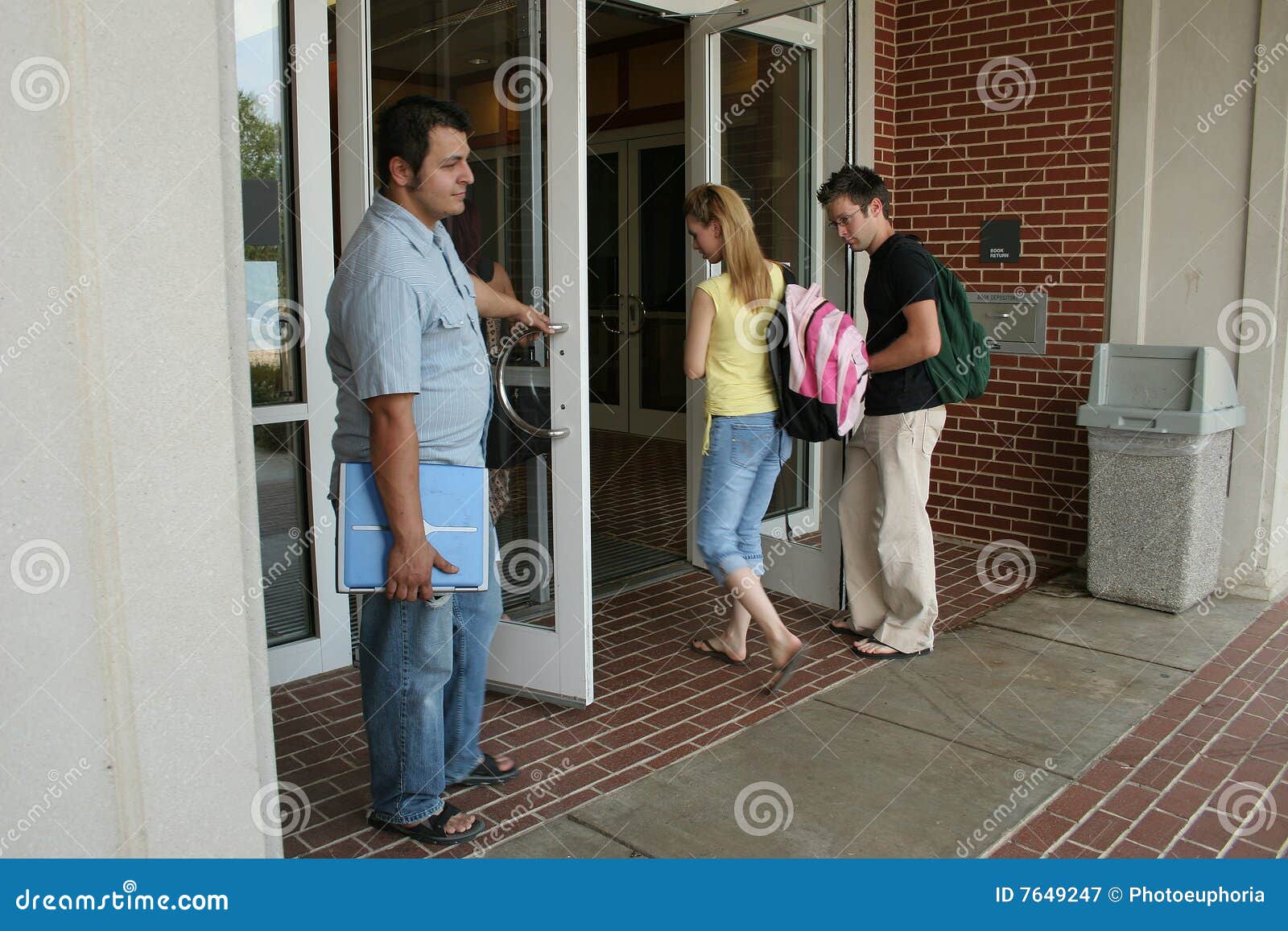 College Students Entering Library. Stock Image - Image of door, book ...