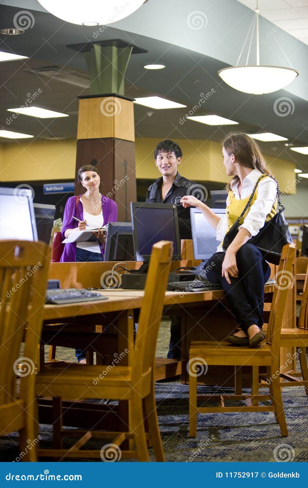 College Students Hanging Out by Library Computers Stock Image - Image ...