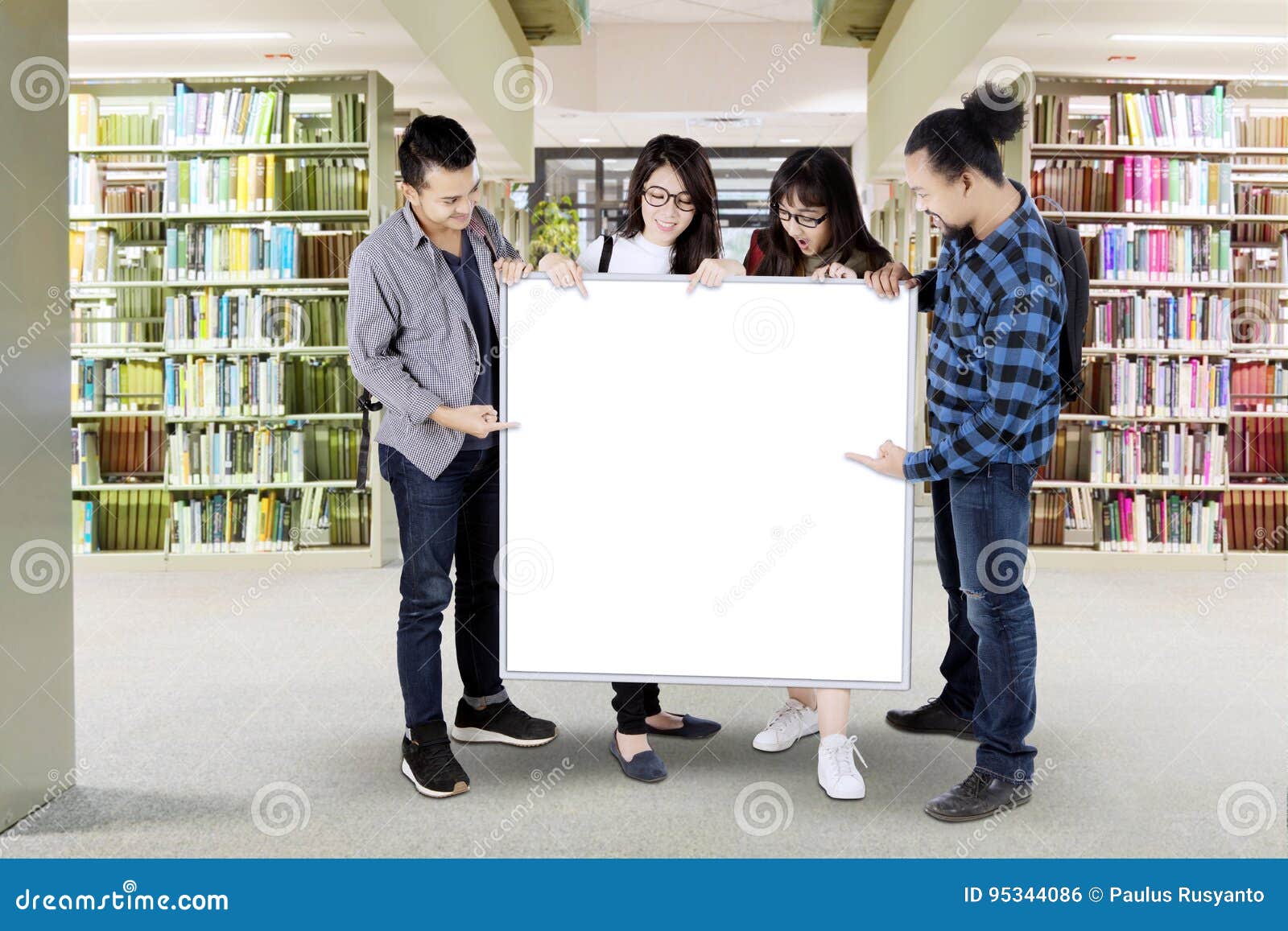 College Students Hold Whiteboard in Library Stock Photo - Image of afro ...