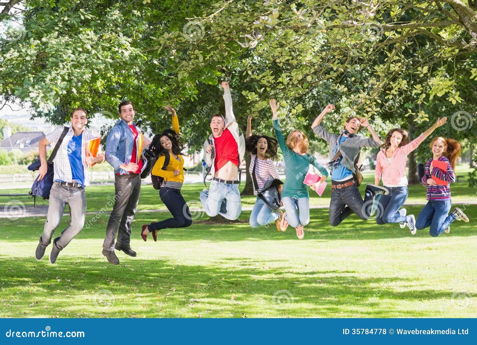 College Students Jumping in the Park Stock Photo - Image of team ...