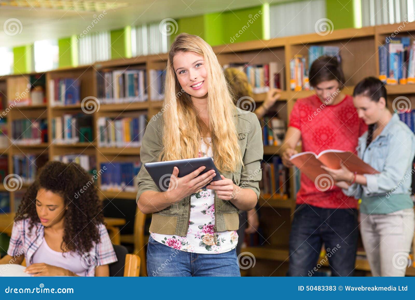 College Students in Library Stock Image - Image of fair, female: 50483383