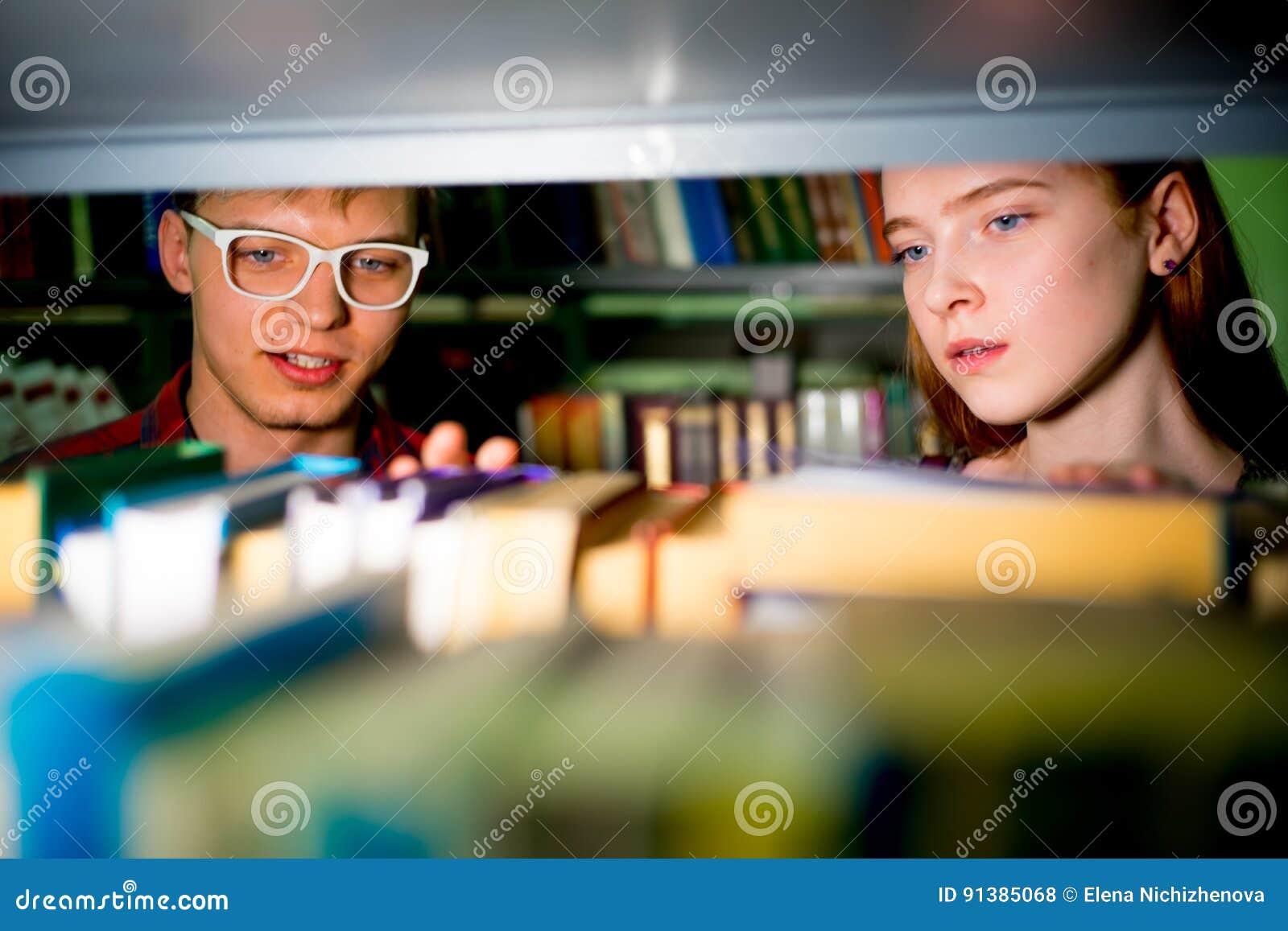 College Students in Library Stock Photo - Image of male, bookshelf ...