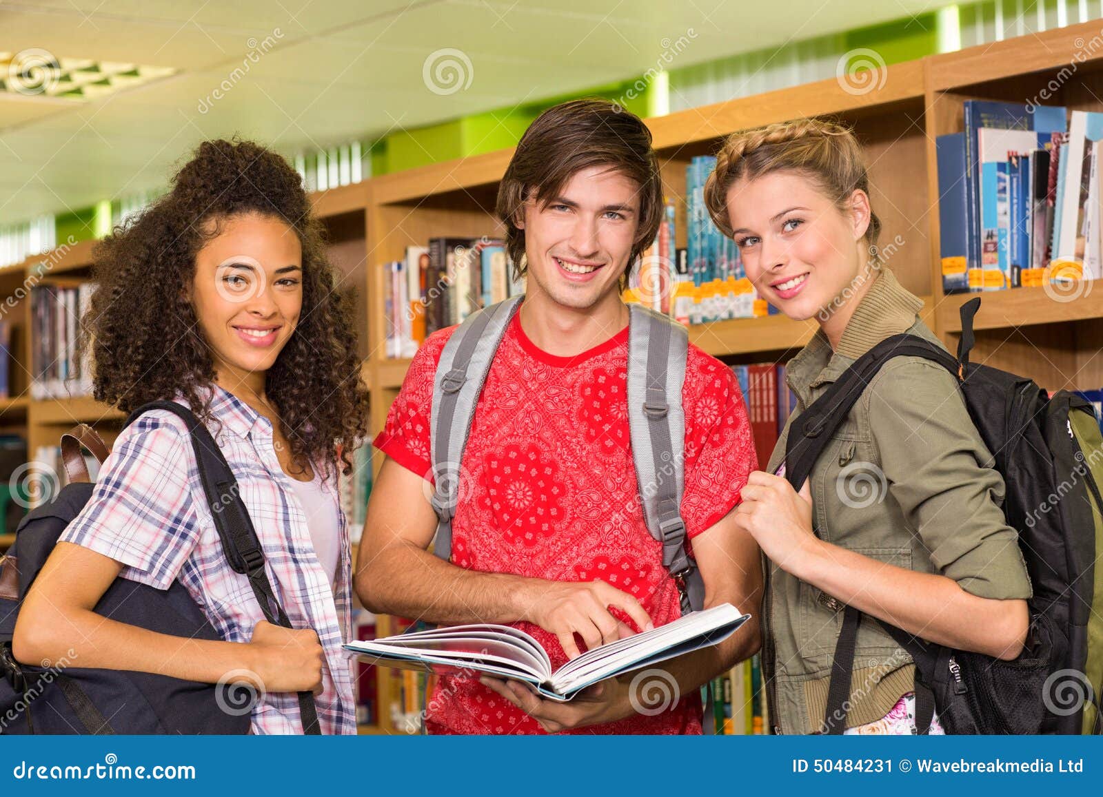 College Students Reading Book in Library Stock Image - Image of book ...