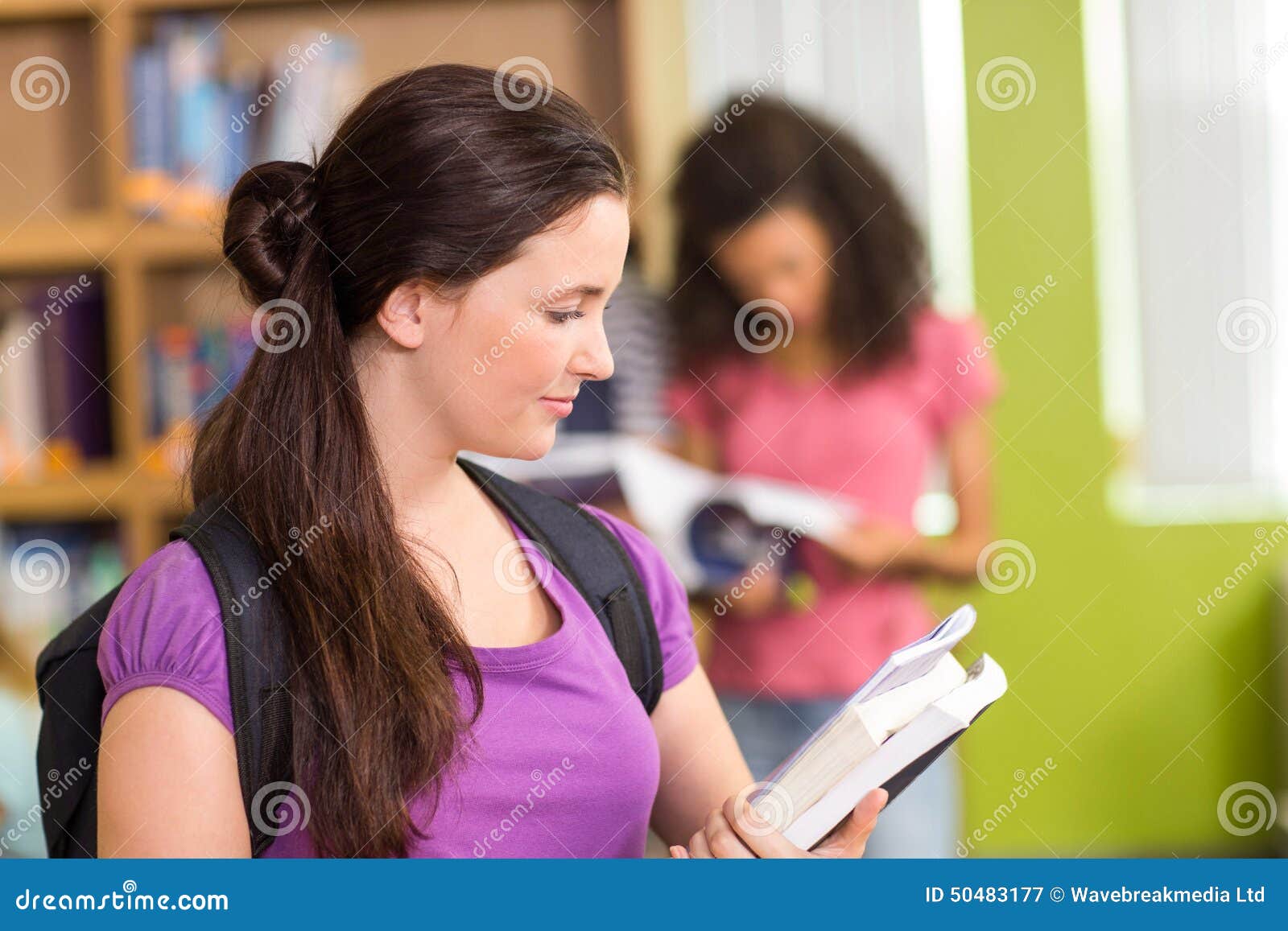 College Students Reading Books in Library Stock Image - Image of ...