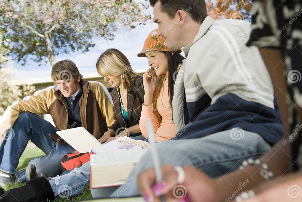 College Students Relaxing on Campus Stock Photo - Image of looking ...
