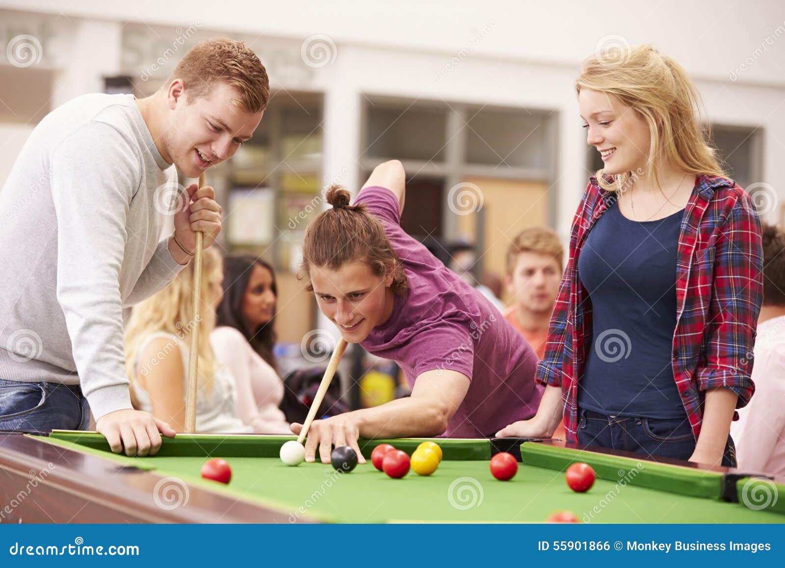 College Students Relaxing and Playing Pool Together Stock Photo - Image ...