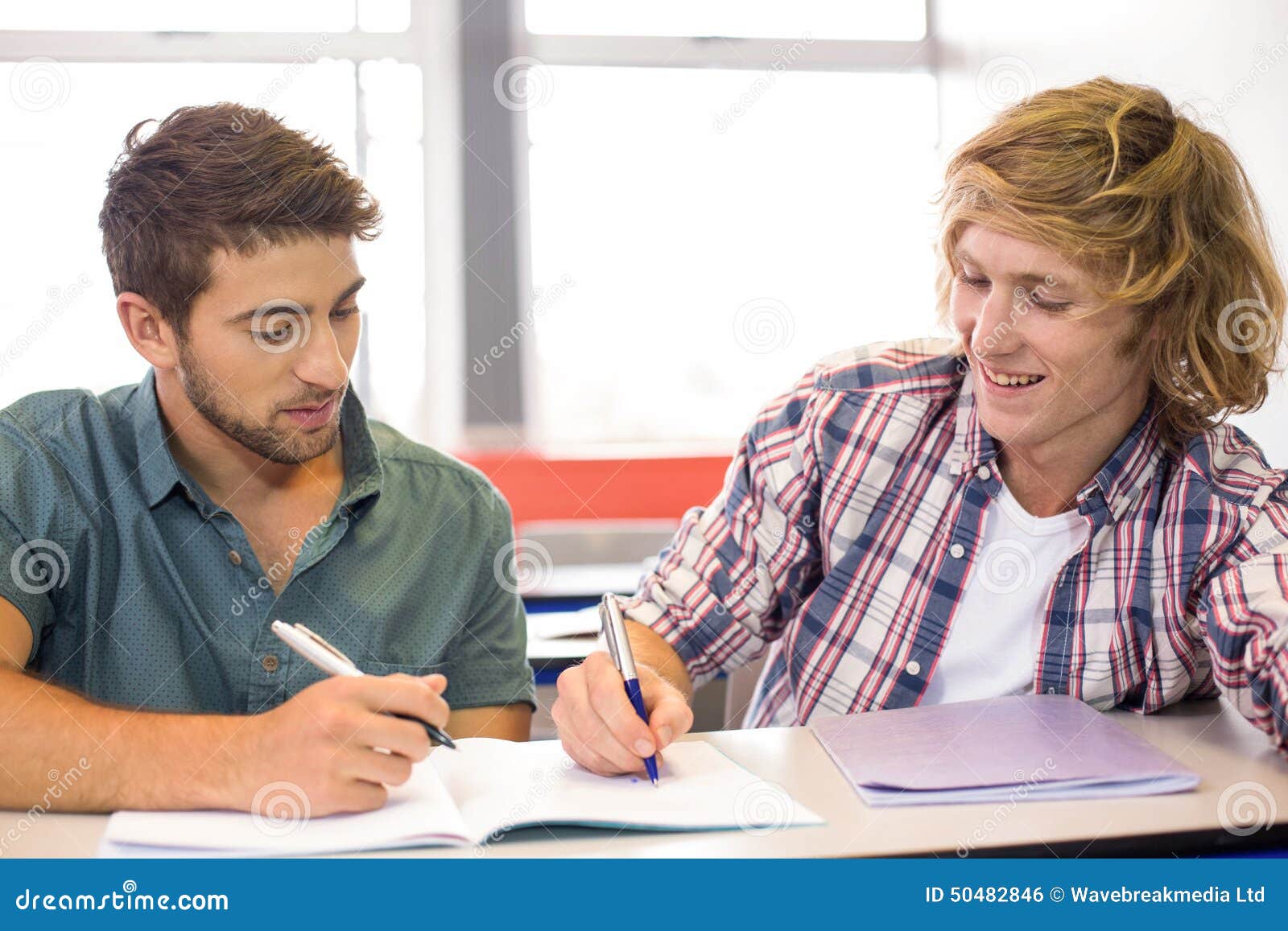 College Students Sitting in Classroom Stock Photo - Image of academic ...
