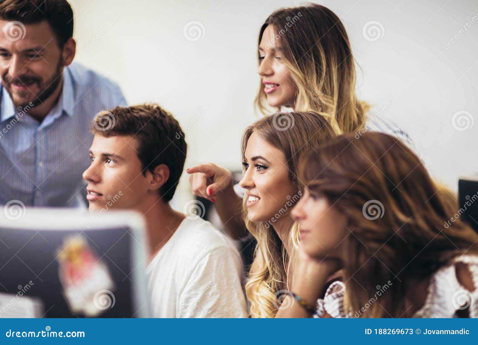 Students Sitting in a Classroom, Using Computers during Class Stock ...