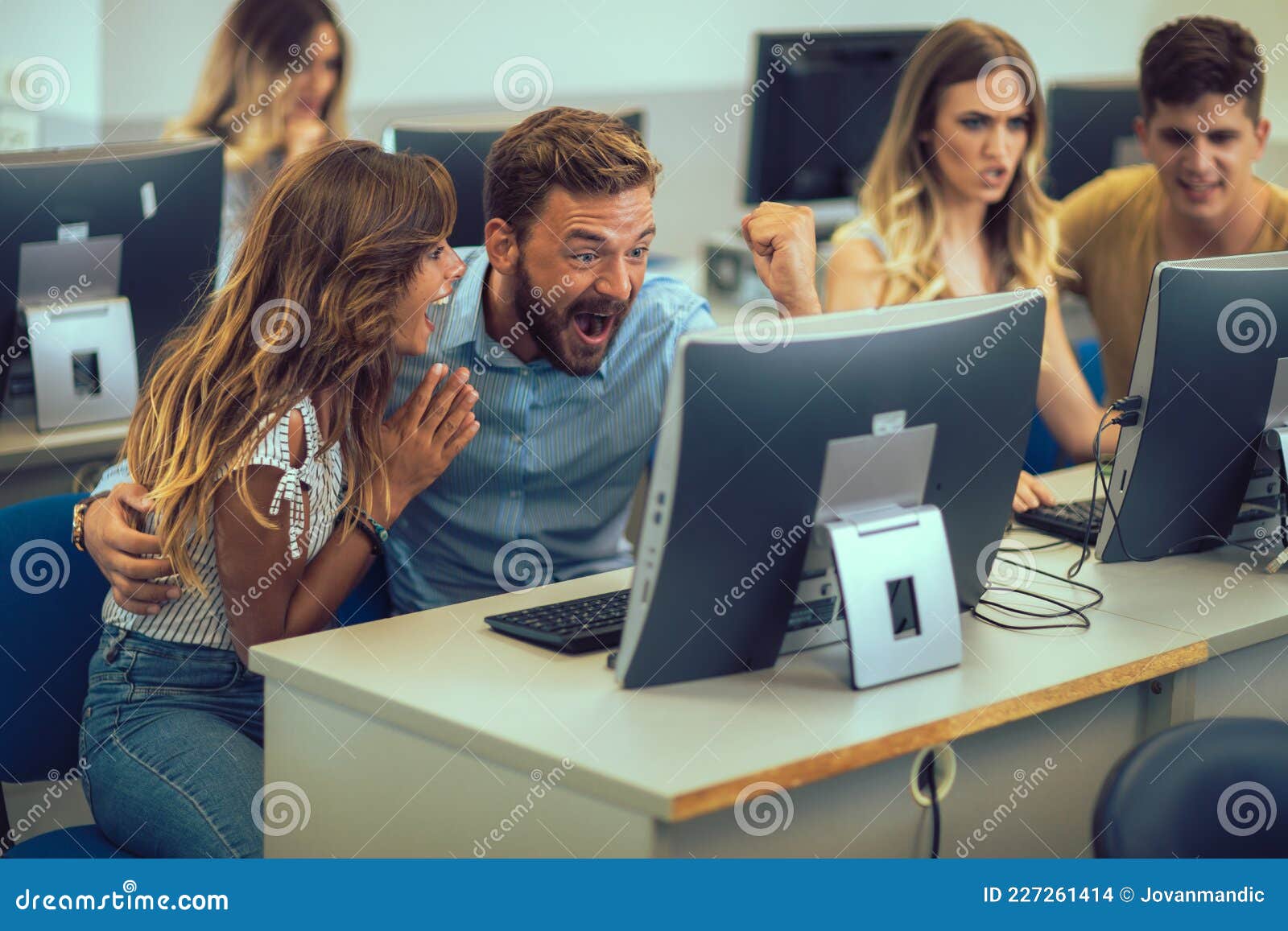 Students Sitting in a Classroom, Using Computers during Class Stock ...