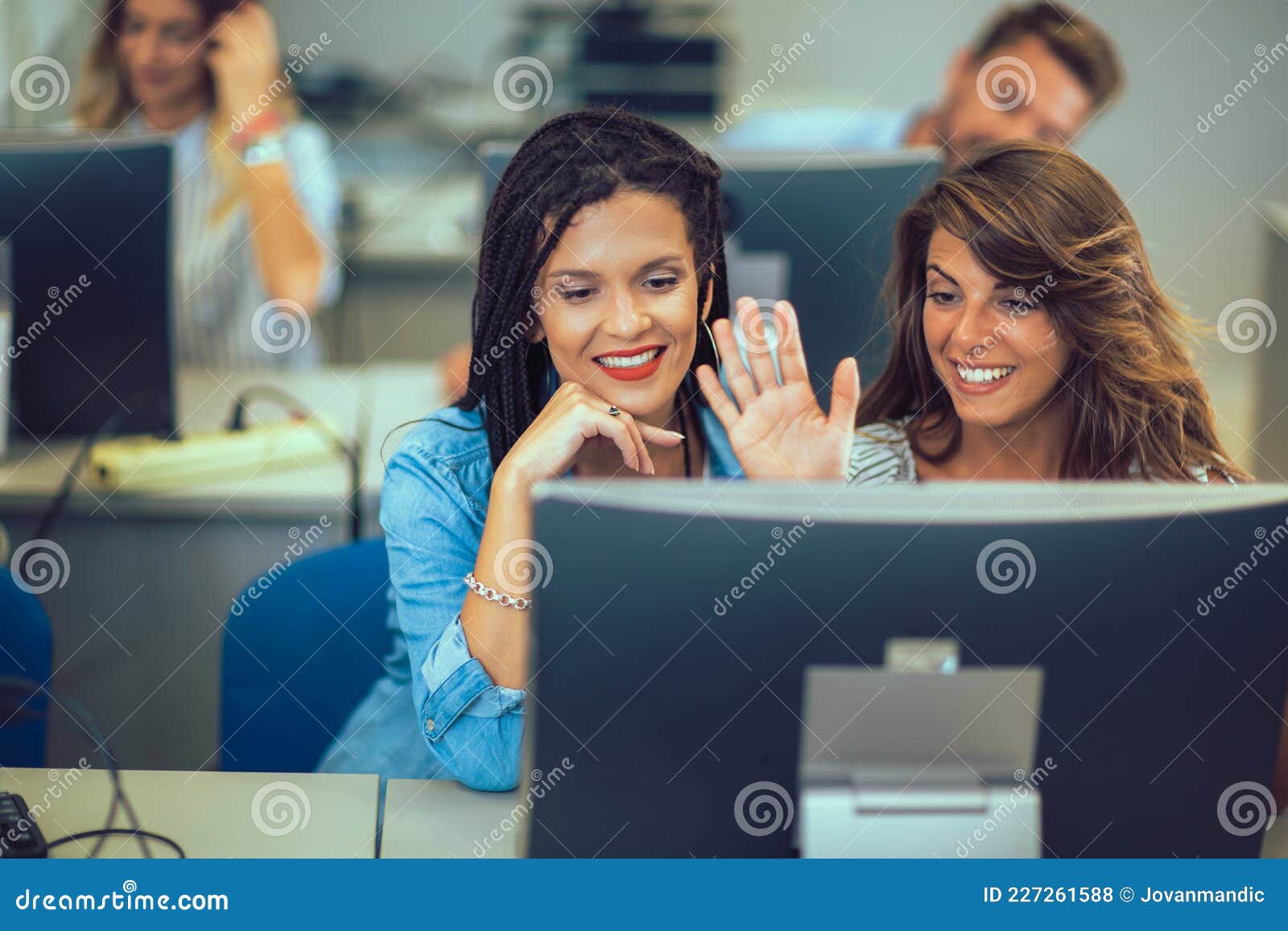 Students Sitting in a Classroom, Using Computers during Class Stock ...
