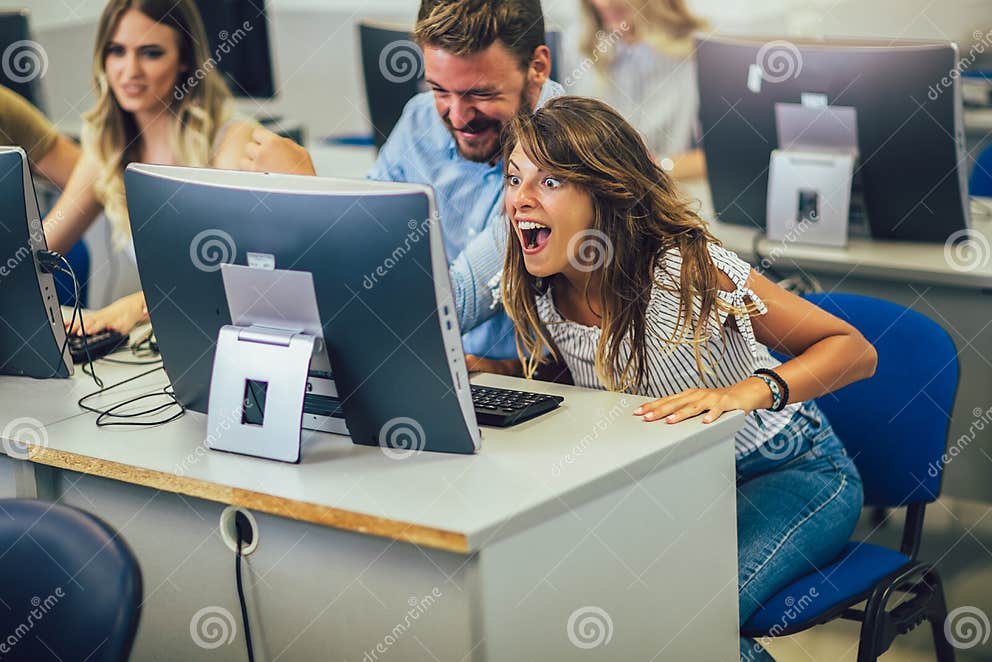Students Sitting in a Classroom, Using Computers during Class Stock ...