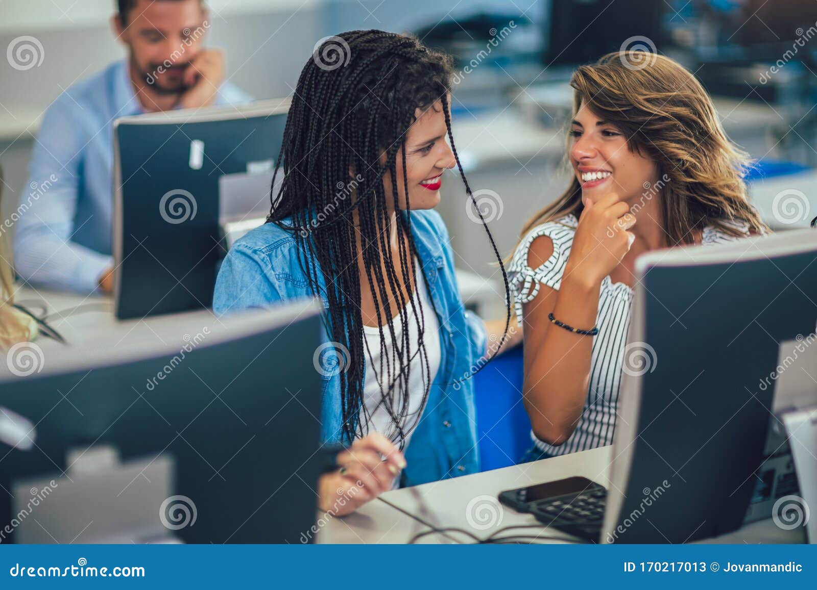 Students Sitting in a Classroom, Using Computers during Class Stock ...