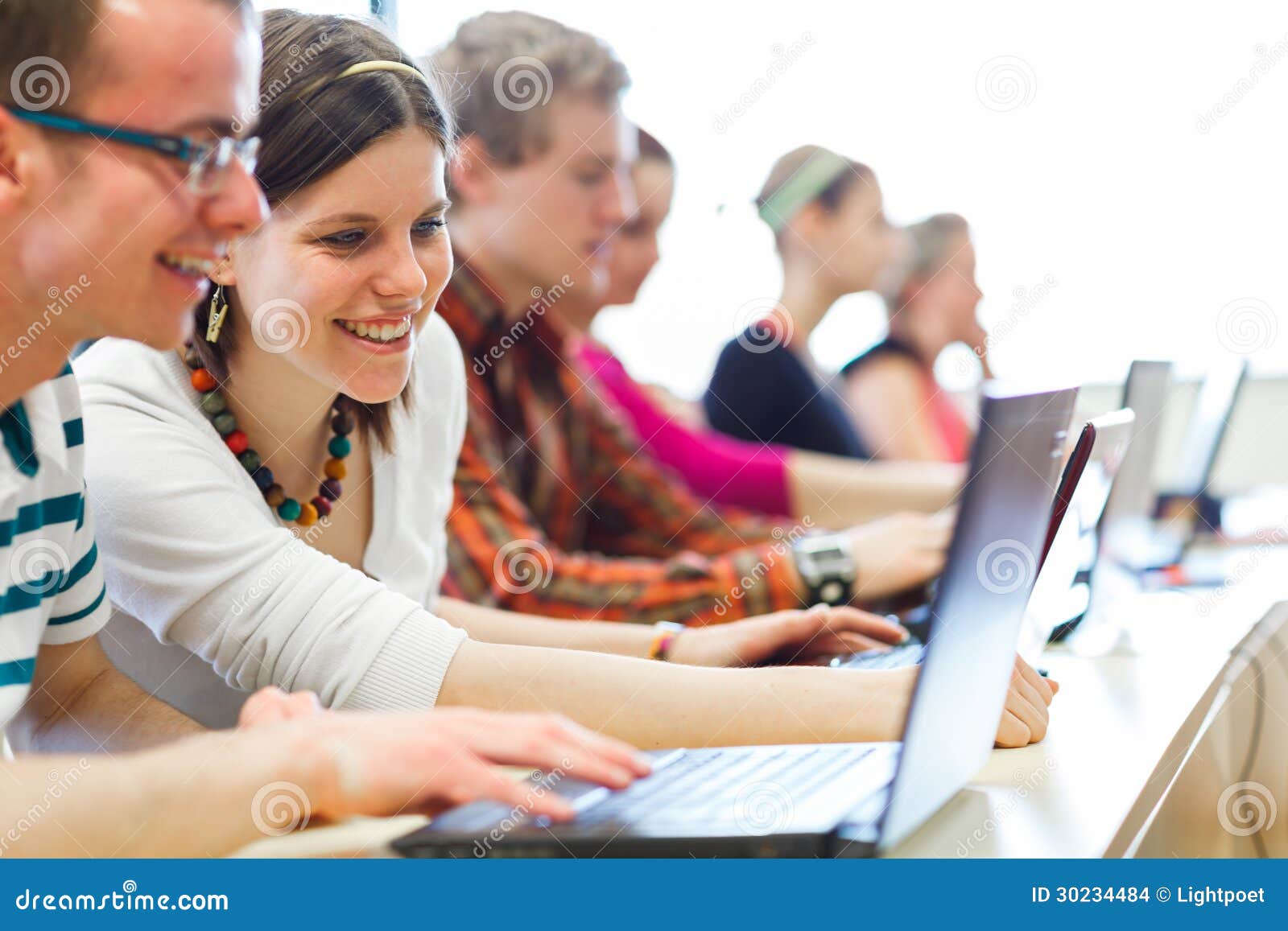 College Students Sitting in a Classroom Stock Photo - Image of adult ...