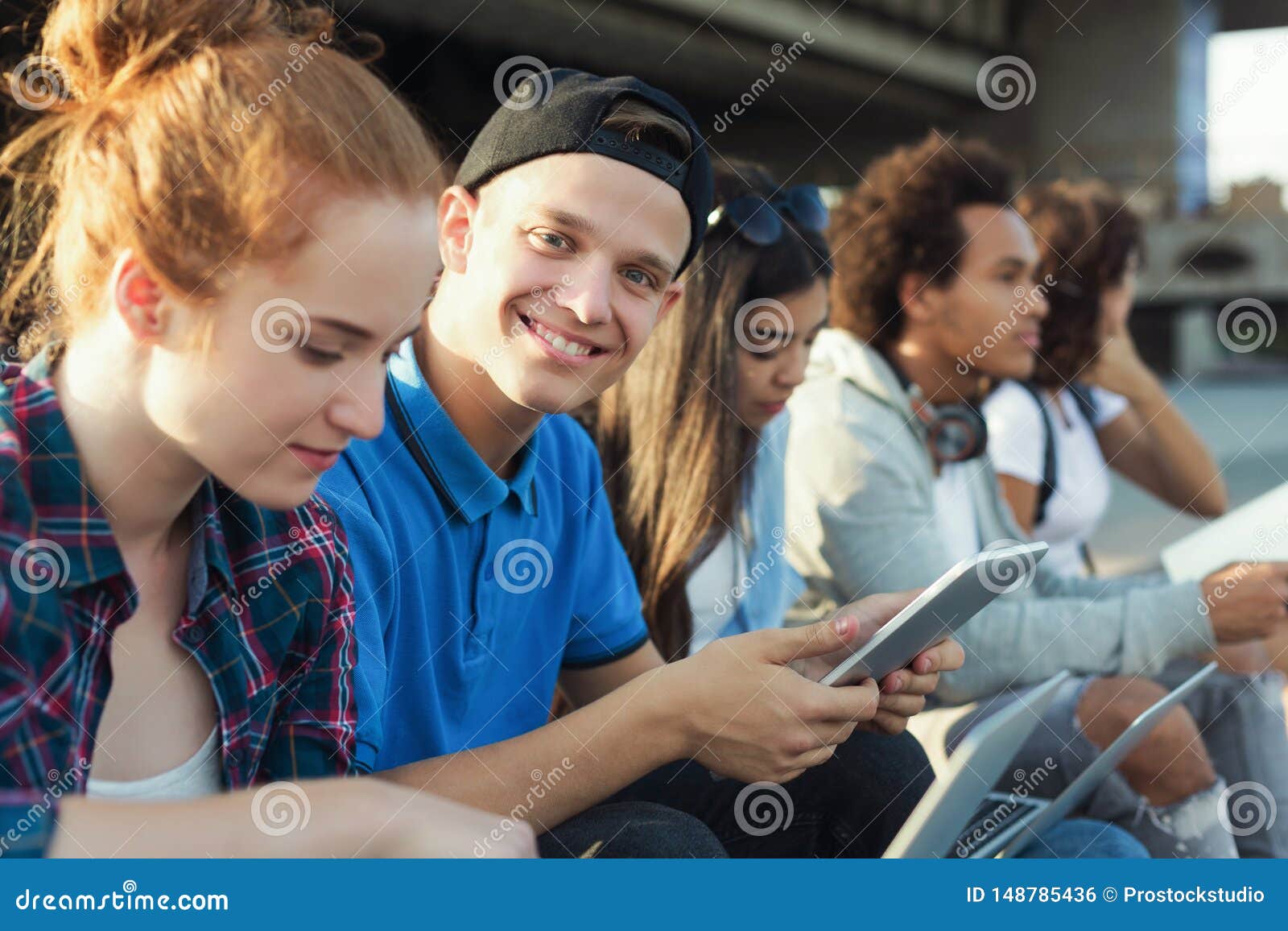 College Students Studying Outdoor, Preparing for Exams Stock Photo ...