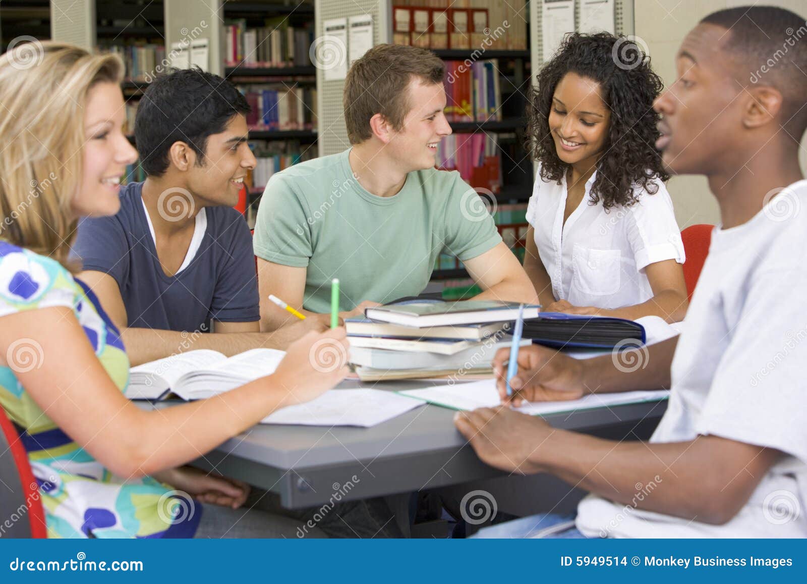 College Students Studying Together in a Library Stock Photo - Image of ... College Students Studying Together in a Library Stock Photo - Image of ...