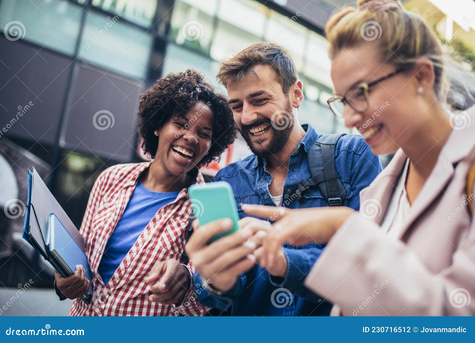 Students Studying on University Campus Outdoor, Using Phone Stock Photo ...