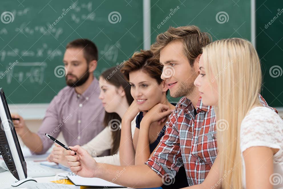 College Students Studying Using a Computer Stock Image - Image of ...