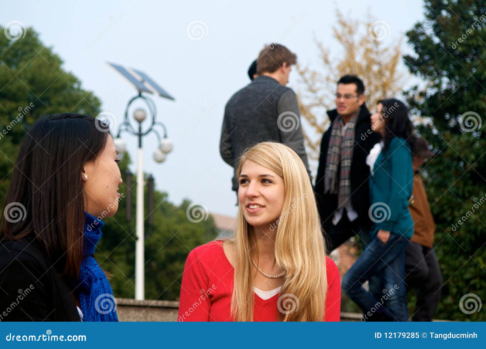 College Students talking stock image. Image of outdoor - 12179285