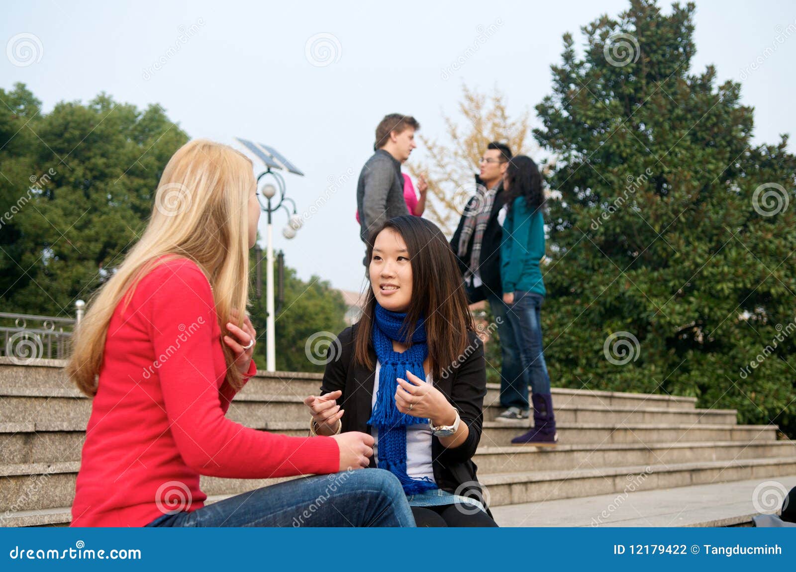 College Students talking stock photo. Image of friends - 12179422