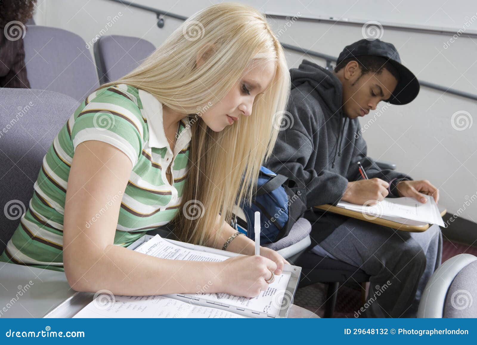 College Students Writing Notes Stock Photo - Image of book, female ...