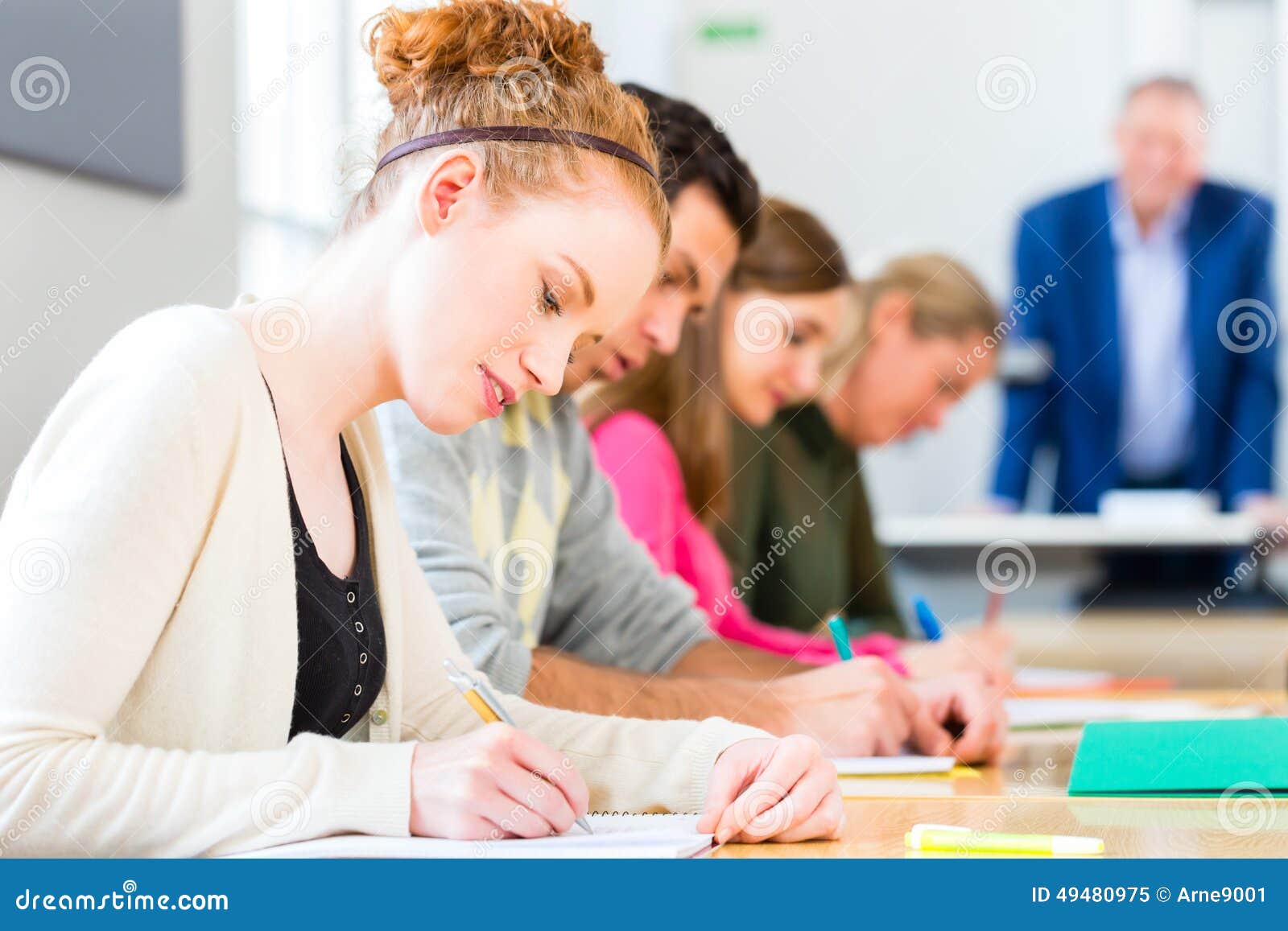 College Students Writing Test or Exam Stock Image - Image of students ...