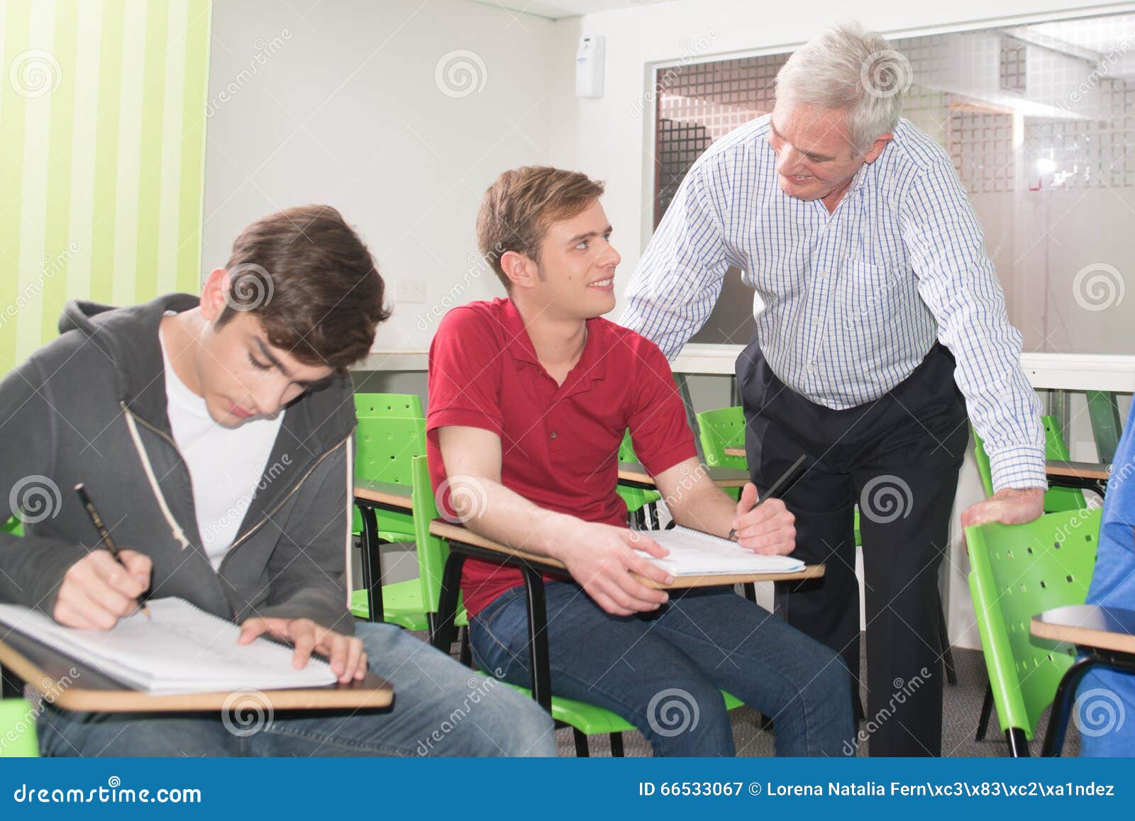 College Teacher Helps His Students Stock Image - Image of caucasian ...