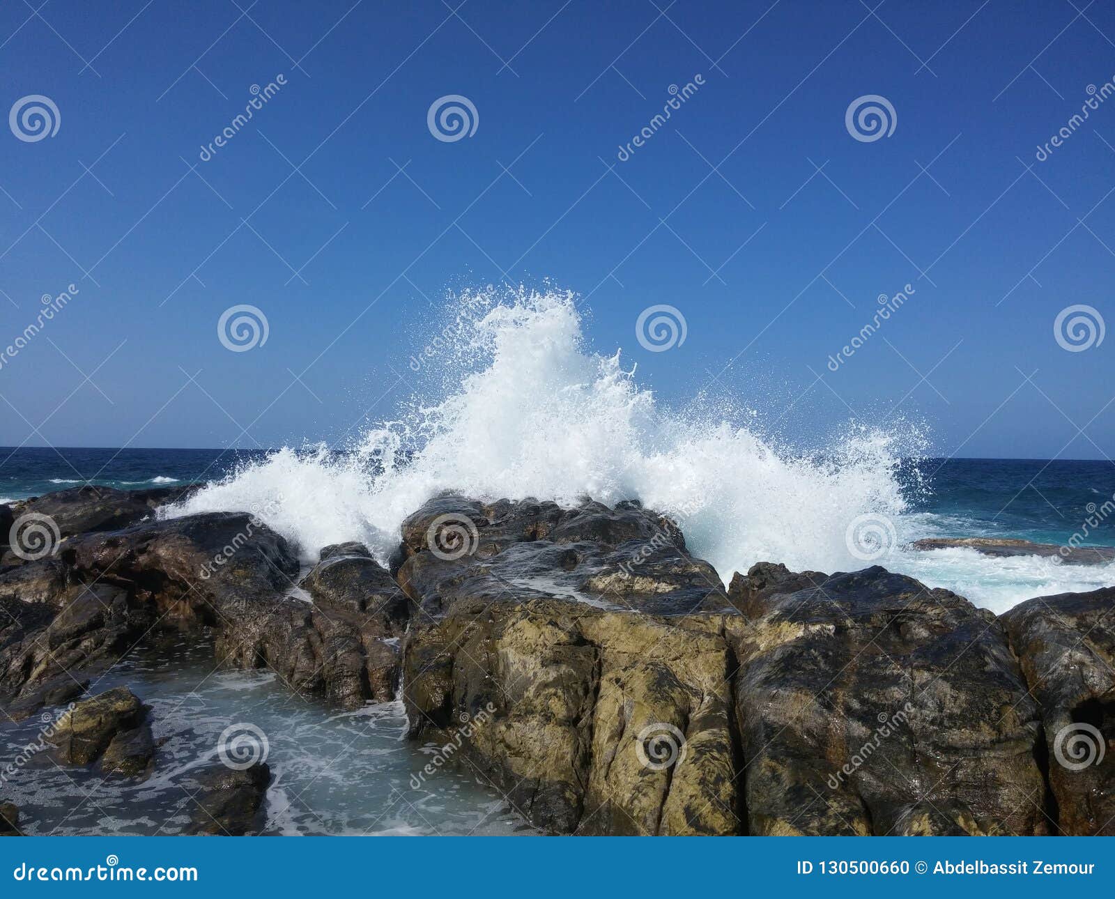 Collision of Wave with Rocks Stock Photo - Image of jijel, nice: 130500660
