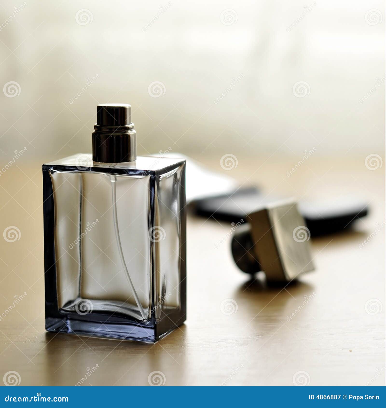 Cologne bottle and phone stock image. Image of pink, scent - 4866887