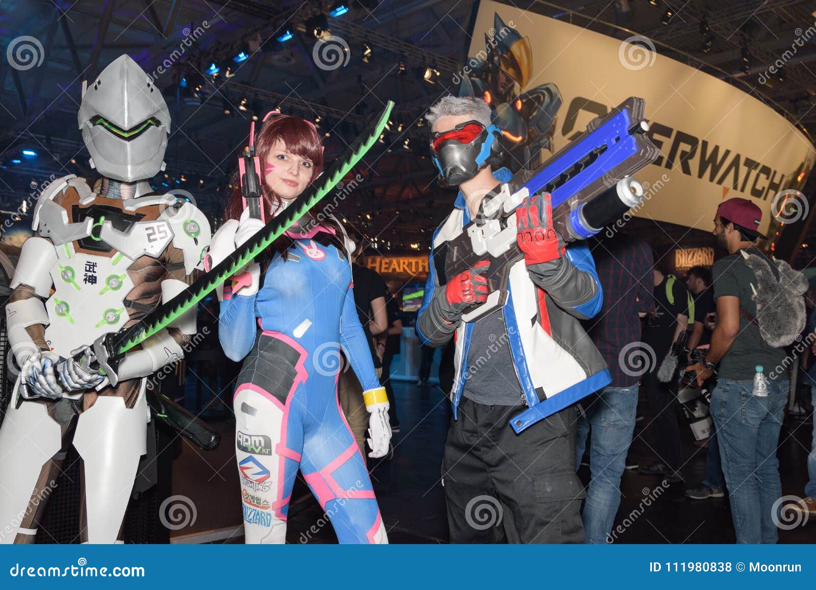 Three Cosplayer are Posing with Weapons at the Trade Fair Gamesc ...