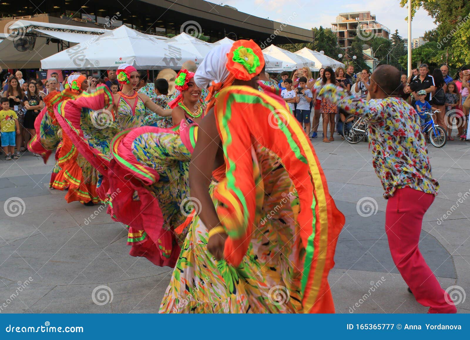 Colombian Dancers In Lavish Motley Costumes Street Performance