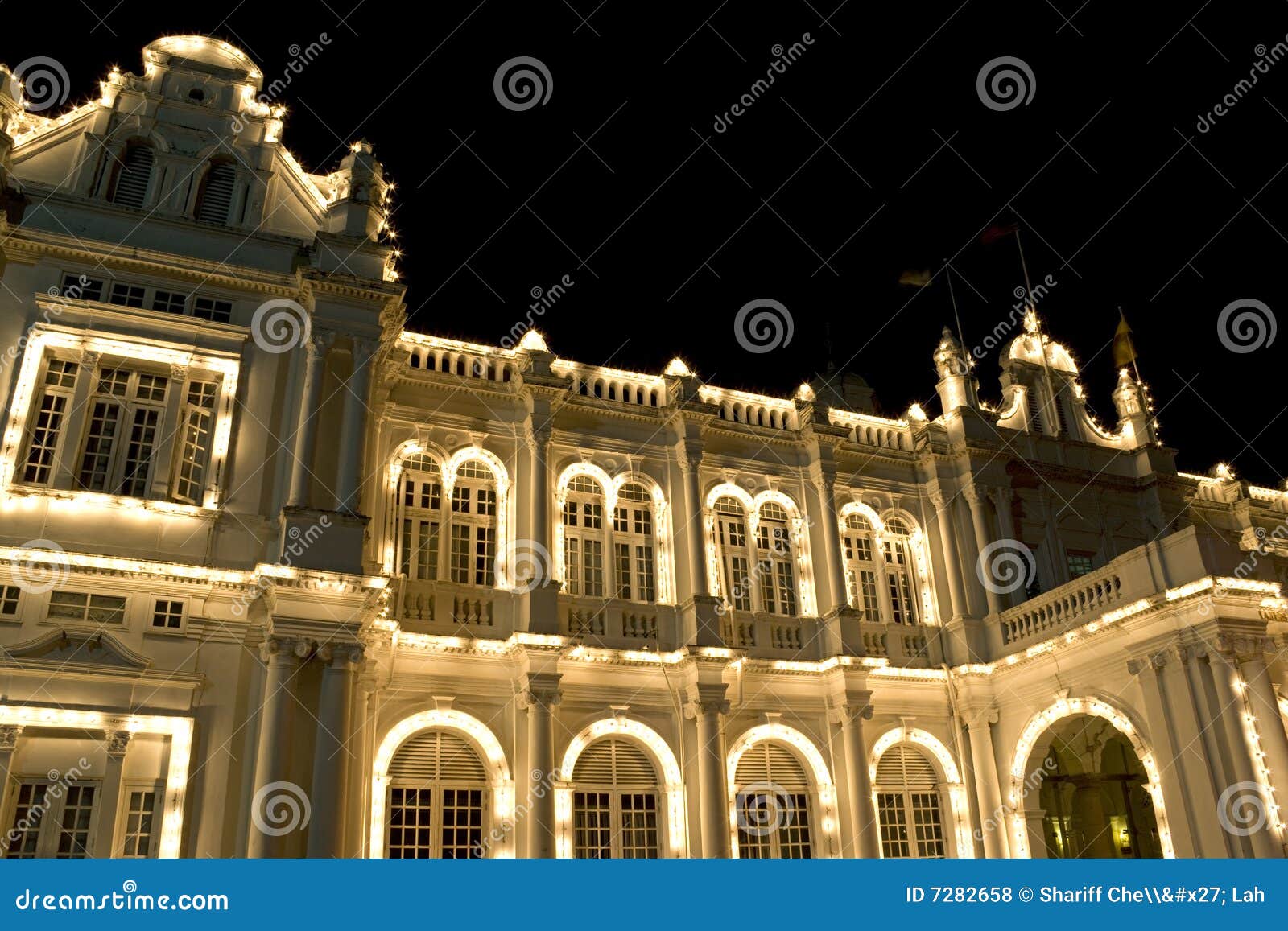 Colonial Building With A White Facade With Green Tiles Surrounded By ...