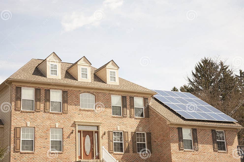 Colonial House with Solar Panel Stock Image - Image of environmentally ...