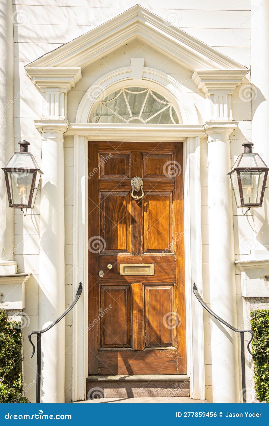 A Colonial Style Front Door with an Eccentric Door Frame Stock Photo ...