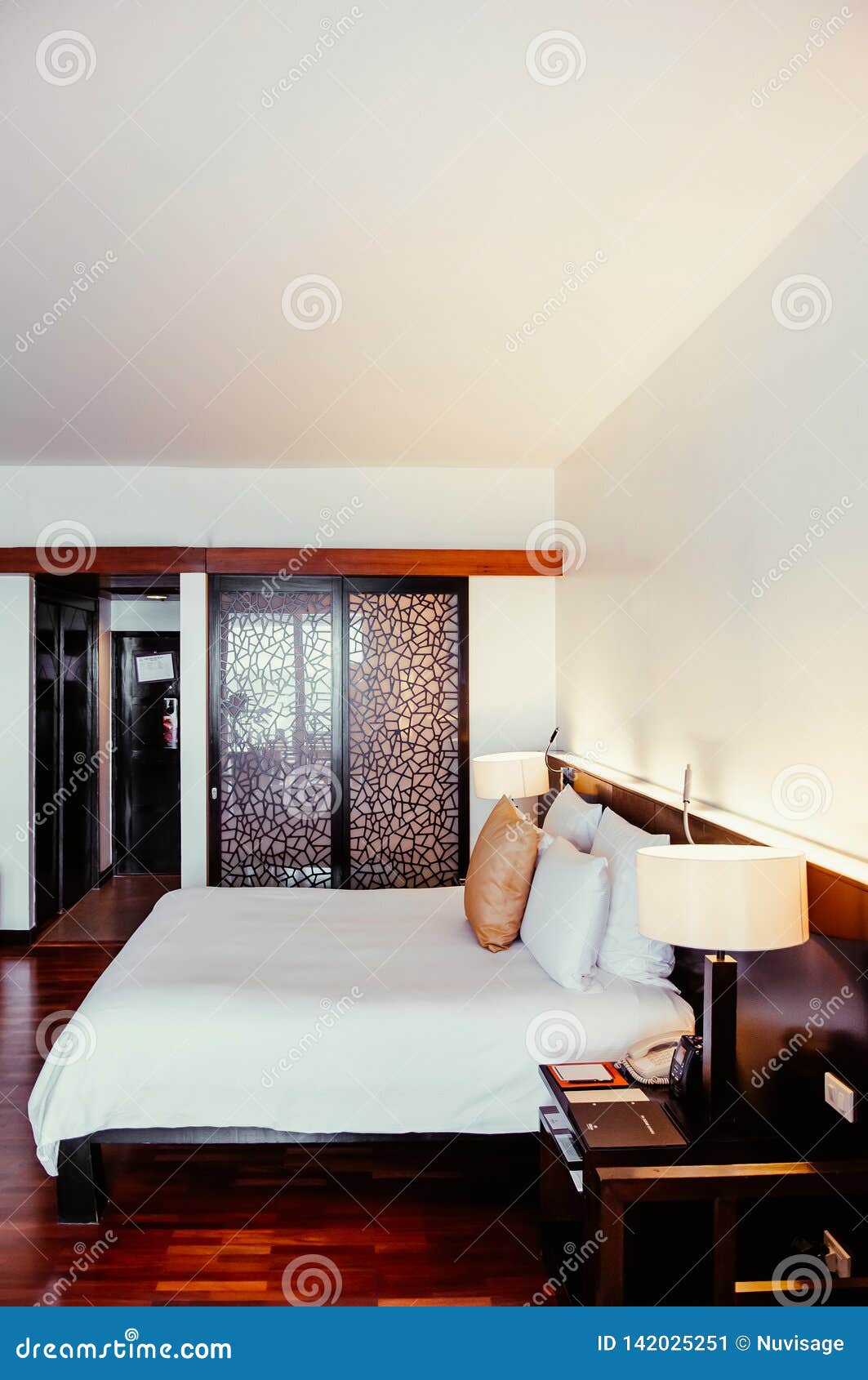 Colonial Vintage White Cozy Hotel Bedroom With Classic Wooden Bed
