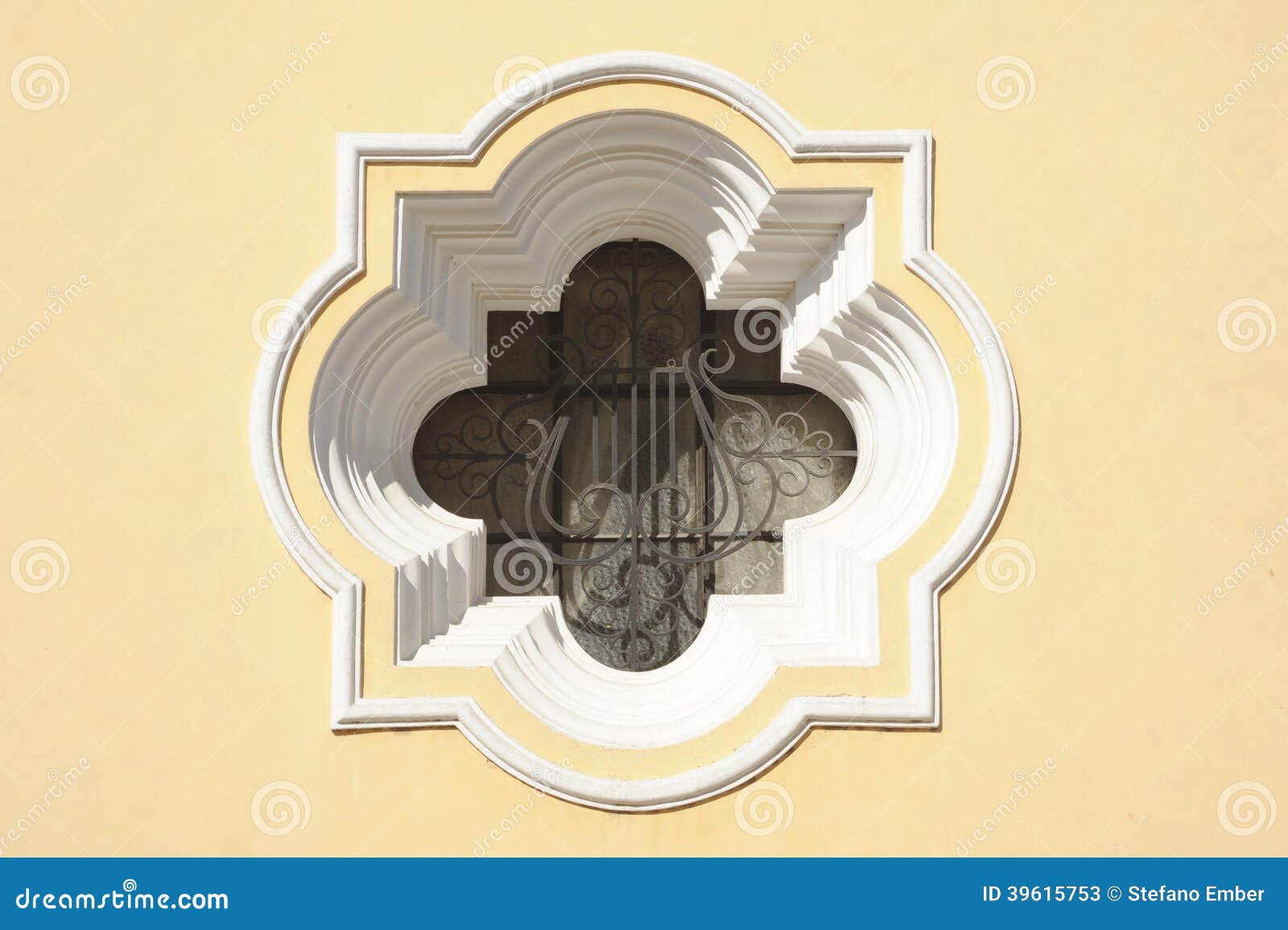 A Colonial Ear Window With A Small Balcony With Eroded Stucco Siding ...