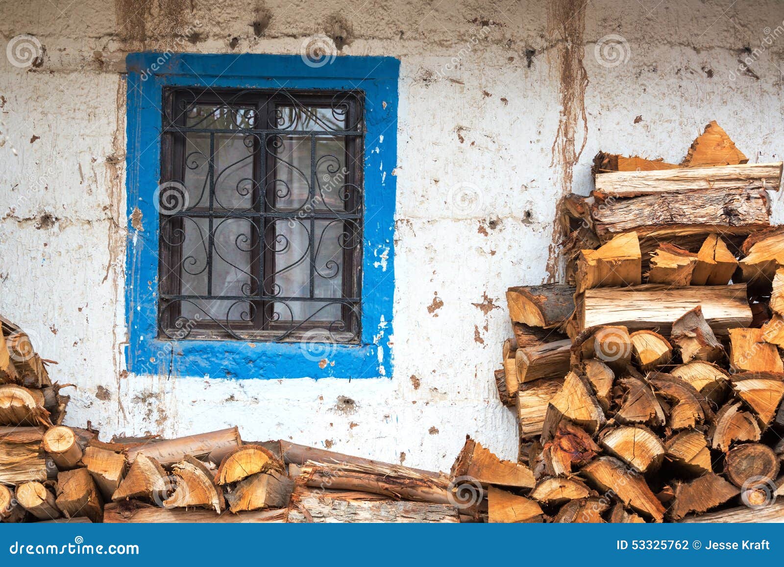 A Colonial Ear Window With A Small Balcony With Eroded Stucco Siding ...