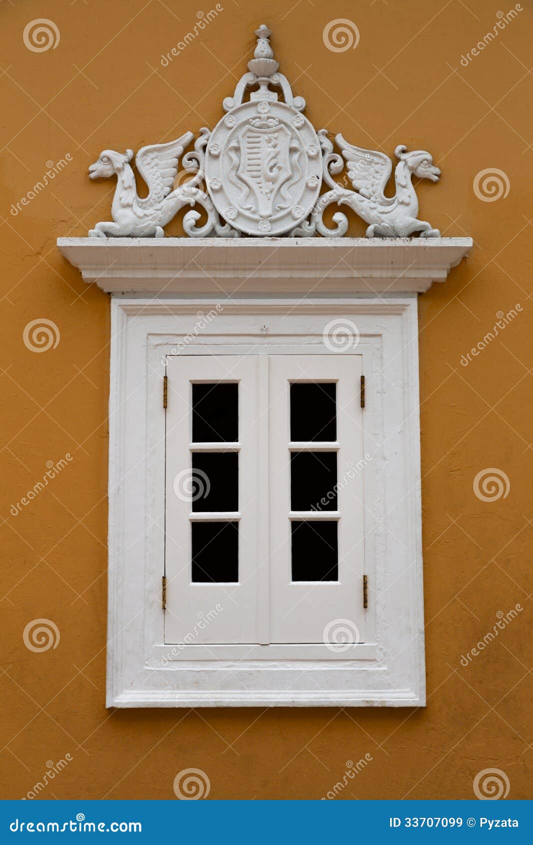 A Colonial Ear Window With A Small Balcony With Eroded Stucco Siding ...